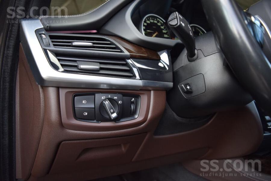 Grey BMW X5 2015 in Riga, with an engine capacity of 3.00 L and mileage of 181 thousand km for 19900 €, photo 12 on AUTOMOTO.COM.LV