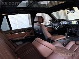 Grey BMW X5 2015 in Riga, with an engine capacity of 3.00 L and mileage of 210 thousand km for 18750 €, photo 6 on AUTOMOTO.COM.LV