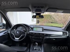 Grey BMW X5 2015 in Riga, with an engine capacity of 2.00 L and mileage of 247 thousand km for 23353 €, photo 7 on AUTOMOTO.COM.LV