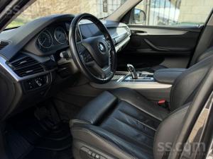 Grey BMW X5 2015 in Riga, with an engine capacity of 2.00 L and mileage of 247 thousand km for 23353 €, photo 11 on AUTOMOTO.COM.LV