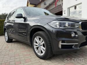 Grey BMW X5 2015 in Riga, with an engine capacity of 2.00 L and mileage of 247 thousand km for 23353 €, photo 17 on AUTOMOTO.COM.LV