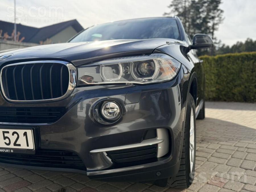 Grey BMW X5 2015 in Riga, with an engine capacity of 2.00 L and mileage of 247 thousand km for 23353 €, photo 20 on AUTOMOTO.COM.LV