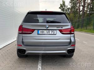 Grey BMW X5 2015 in Riga, with an engine capacity of 3.00 L and mileage of 0 thousand km for 19900 €, photo 9 on AUTOMOTO.COM.LV