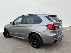 Grey BMW X5 2015 in Riga, with an engine capacity of 3.00 L and mileage of 0 thousand km for 19900 €, photo 12 on AUTOMOTO.COM.LV