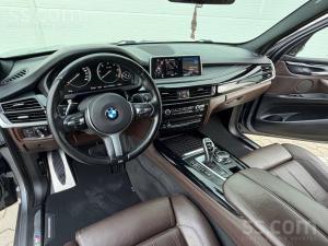 Grey BMW X5 2015 in Riga, with an engine capacity of 3.00 L and mileage of 0 thousand km for 19900 €, photo 20 on AUTOMOTO.COM.LV