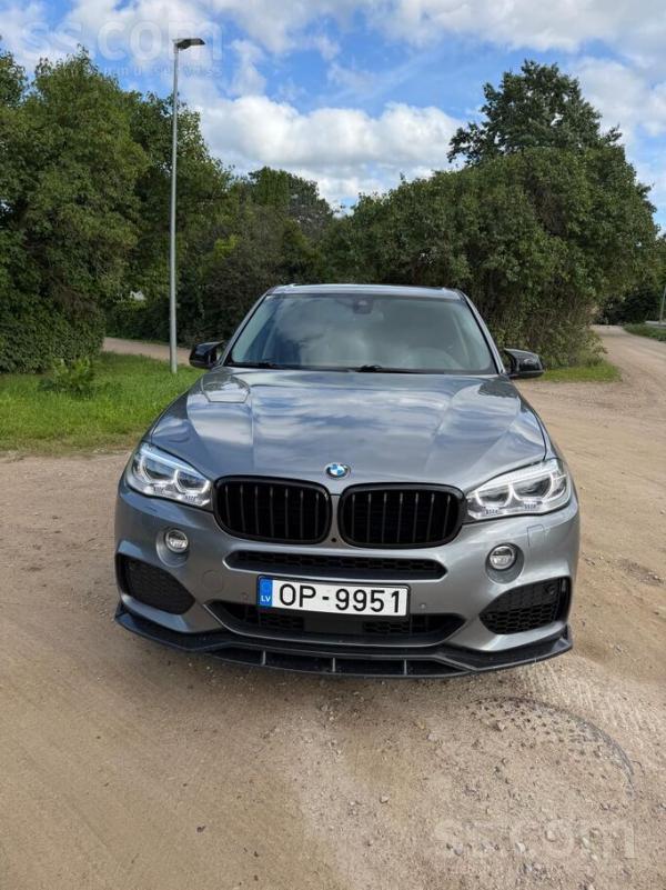 Grey BMW X5 2015 in Ogre, with an engine capacity of 2.00 L and mileage of 230 thousand km for 22000 €, photo 1 on AUTOMOTO.COM.LV