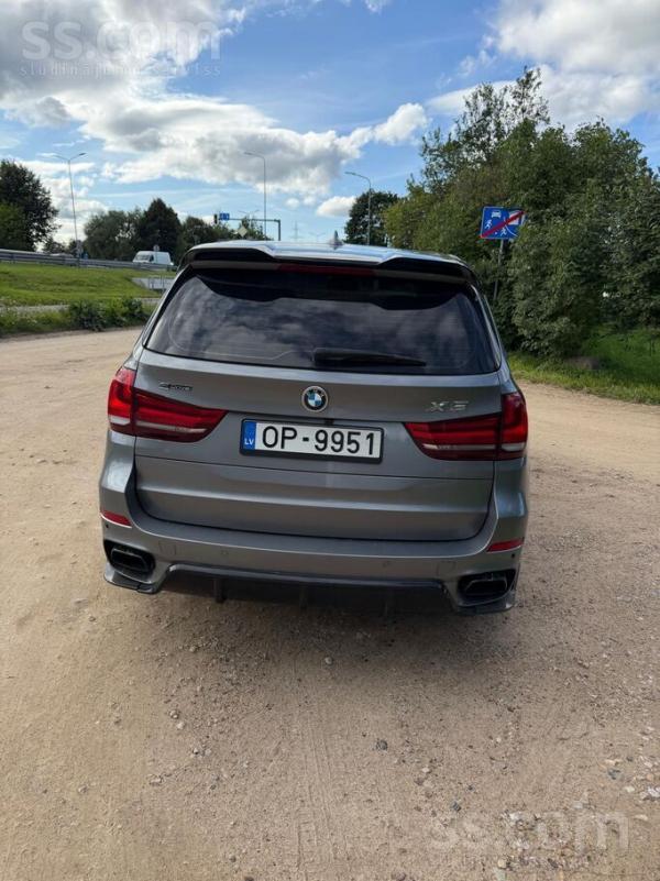 Grey BMW X5 2015 in Ogre, with an engine capacity of 2.00 L and mileage of 230 thousand km for 22000 €, photo 3 on AUTOMOTO.COM.LV
