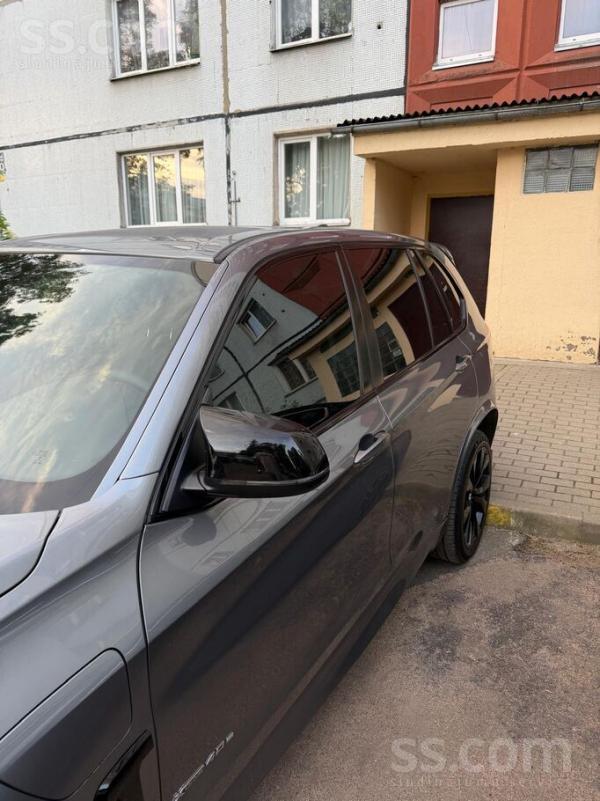 Grey BMW X5 2015 in Ogre, with an engine capacity of 2.00 L and mileage of 230 thousand km for 22000 €, photo 4 on AUTOMOTO.COM.LV
