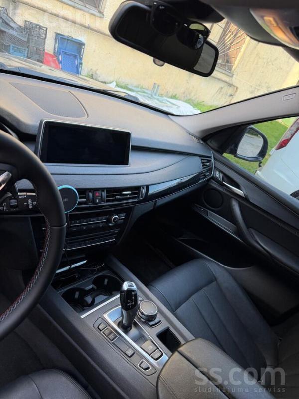 Grey BMW X5 2015 in Ogre, with an engine capacity of 2.00 L and mileage of 230 thousand km for 22000 €, photo 9 on AUTOMOTO.COM.LV