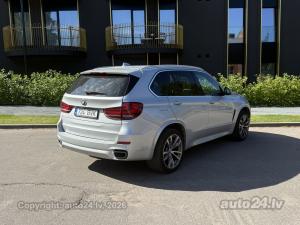 Grey BMW X5 2015 in Tallinn, with an engine capacity of 3.00 L and mileage of 185 thousand km for 22990 €, photo 5 on AUTOMOTO.COM.LV