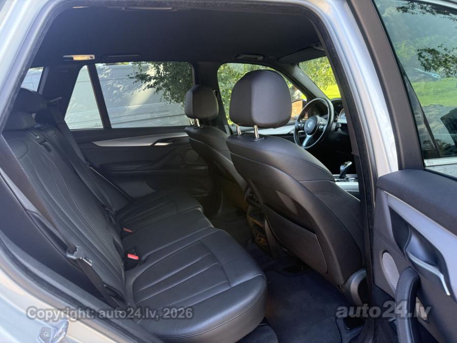 Grey BMW X5 2015 in Tallinn, with an engine capacity of 3.00 L and mileage of 185 thousand km for 22990 €, photo 13 on AUTOMOTO.COM.LV