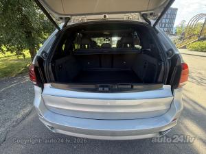 Grey BMW X5 2015 in Tallinn, with an engine capacity of 3.00 L and mileage of 185 thousand km for 22990 €, photo 14 on AUTOMOTO.COM.LV
