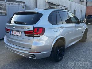 Grey BMW X5 2015 in Daugavpils, with an engine capacity of 2.00 L and mileage of 0 thousand km for 20000 €, photo 7 on AUTOMOTO.COM.LV