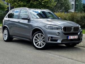 Grey BMW X5 2016 in Riga, with an engine capacity of 2.00 L and mileage of 235 thousand km for 21490 €, photo 4 on AUTOMOTO.COM.LV
