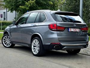 Grey BMW X5 2016 in Riga, with an engine capacity of 2.00 L and mileage of 235 thousand km for 21490 €, photo 5 on AUTOMOTO.COM.LV