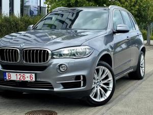 Grey BMW X5 2016 in Riga, with an engine capacity of 2.00 L and mileage of 235 thousand km for 21490 €, photo 10 on AUTOMOTO.COM.LV