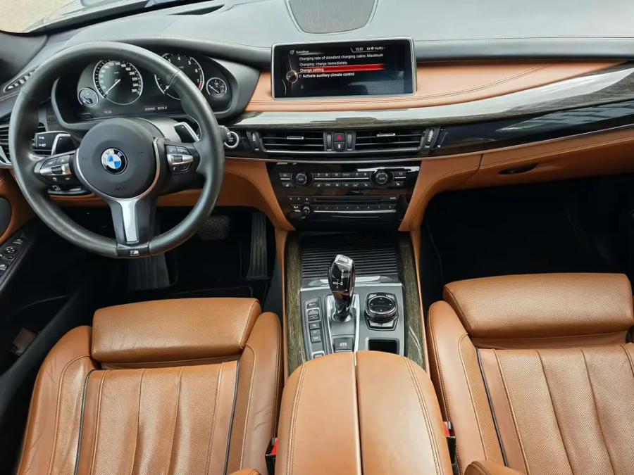 Grey BMW X5 2016 in Riga, with an engine capacity of 2.00 L and mileage of 235 thousand km for 21490 €, photo 13 on AUTOMOTO.COM.LV