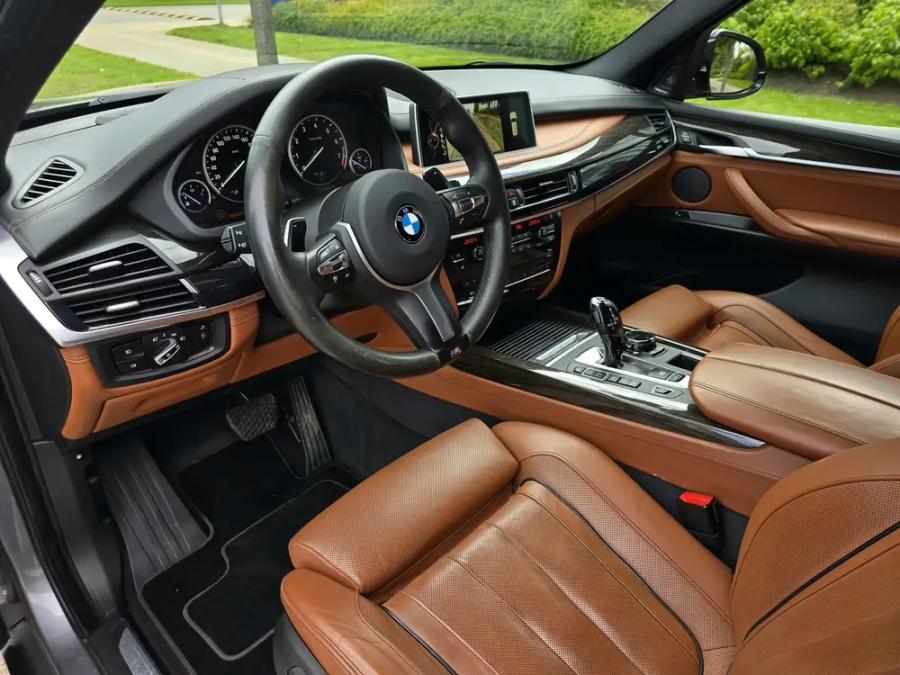 Grey BMW X5 2016 in Riga, with an engine capacity of 2.00 L and mileage of 235 thousand km for 21490 €, photo 14 on AUTOMOTO.COM.LV