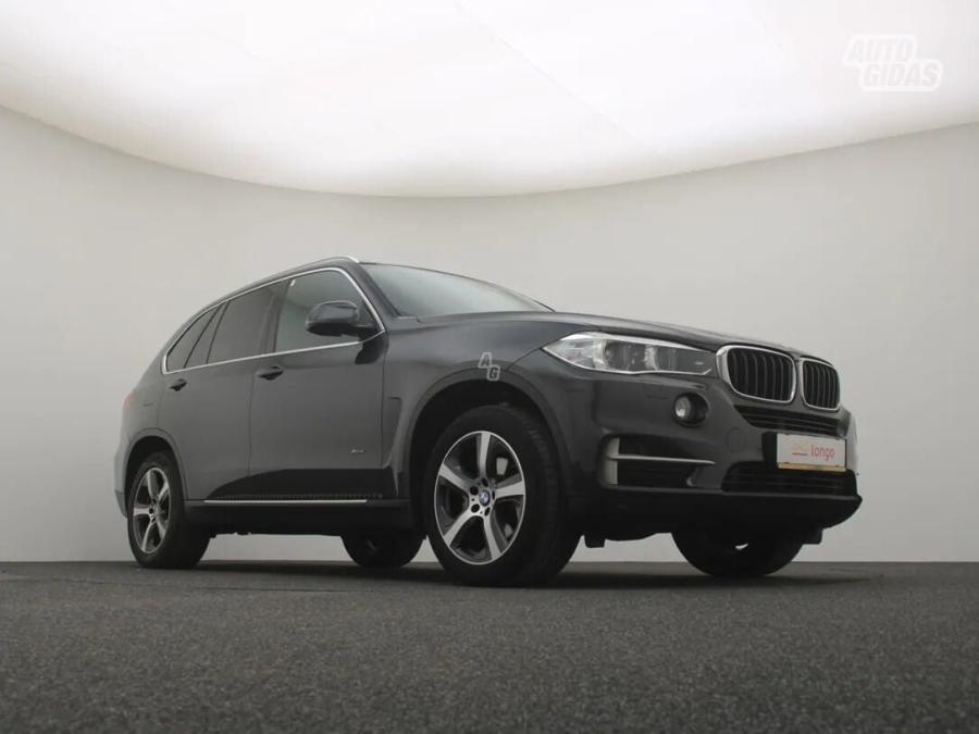 Grey BMW X5 2017 in Vilnius, with an engine capacity of 2.00 L and mileage of 202 thousand km for 22699 €, photo 12 on AUTOMOTO.COM.LV