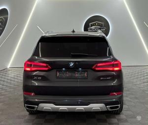 Grey BMW X5 2020 in Marijampole, with an engine capacity of 3.00 L and mileage of 57 thousand km for 37850 €, photo 34 on AUTOMOTO.COM.LV