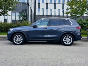 Grey BMW X5 2021 in Riga, with an engine capacity of 3.00 L and mileage of 169 thousand km for 34490 €, photo 10 on AUTOMOTO.COM.LV