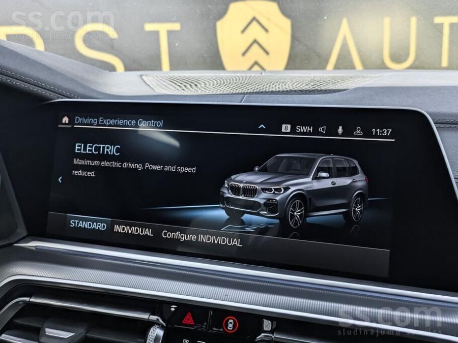 Grey BMW X5 2022 in Tukums, with an engine capacity of 3.00 L and mileage of 125 thousand km for 49990 €, photo 15 on AUTOMOTO.COM.LV