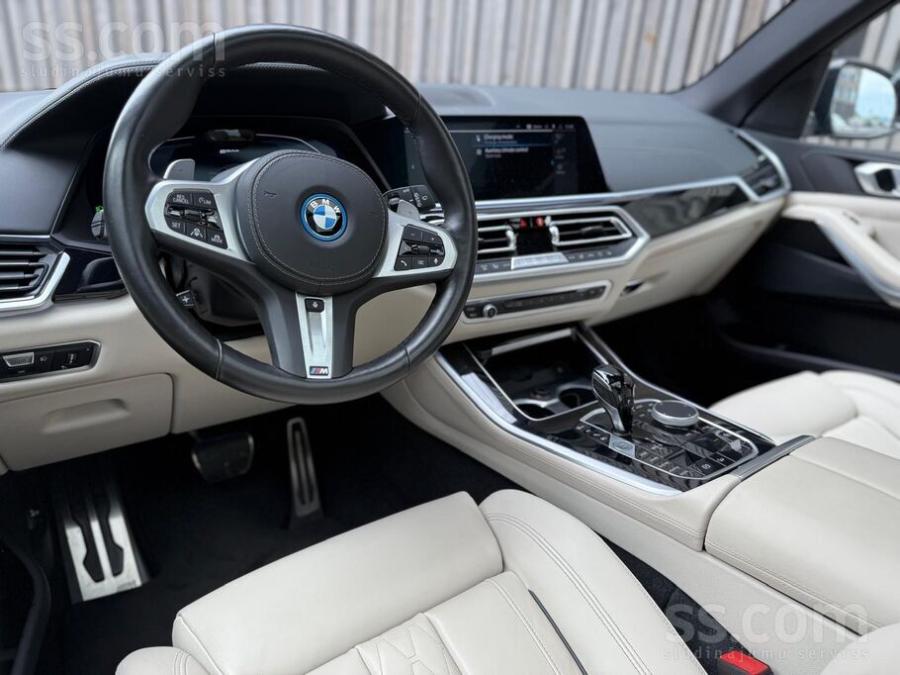 Grey BMW X5 2022 in Riga, with an engine capacity of 3.00 L and mileage of 107 thousand km for 54550 €, photo 7 on AUTOMOTO.COM.LV