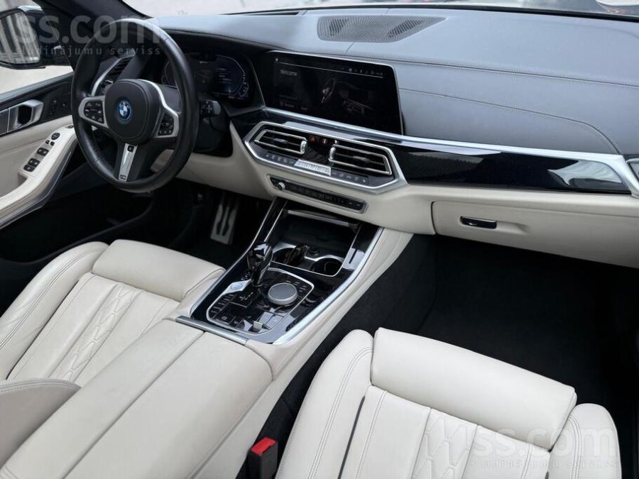 Grey BMW X5 2022 in Riga, with an engine capacity of 3.00 L and mileage of 107 thousand km for 54550 €, photo 16 on AUTOMOTO.COM.LV