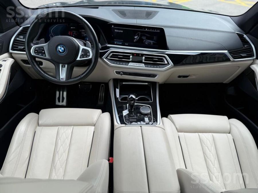 Grey BMW X5 2022 in Riga, with an engine capacity of 3.00 L and mileage of 107 thousand km for 54550 €, photo 19 on AUTOMOTO.COM.LV