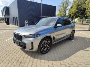 Grey BMW X5 2023 in Kaunas, with an engine capacity of 2.99 L and mileage of 82 thousand km for 64800 €, photo  on AUTOMOTO.COM.LV