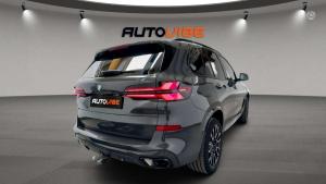 Grey BMW X5 2025 in Vilnius, with an engine capacity of 2.99 L and mileage of 74 thousand km for 77777 €, photo 5 on AUTOMOTO.COM.LV