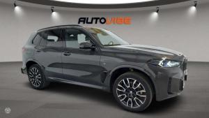 Grey BMW X5 2025 in Vilnius, with an engine capacity of 2.99 L and mileage of 74 thousand km for 77777 €, photo 7 on AUTOMOTO.COM.LV