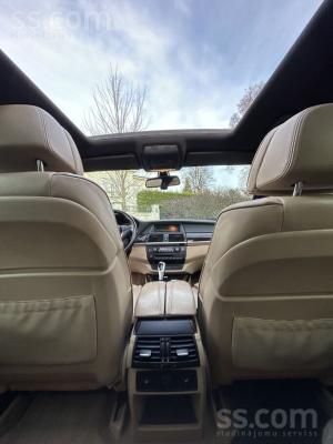 Grey BMW X5 2009 in Riga, with an engine capacity of 2.90 L and mileage of 402 thousand km for 7200 €, photo 12 on AUTOMOTO.COM.LV