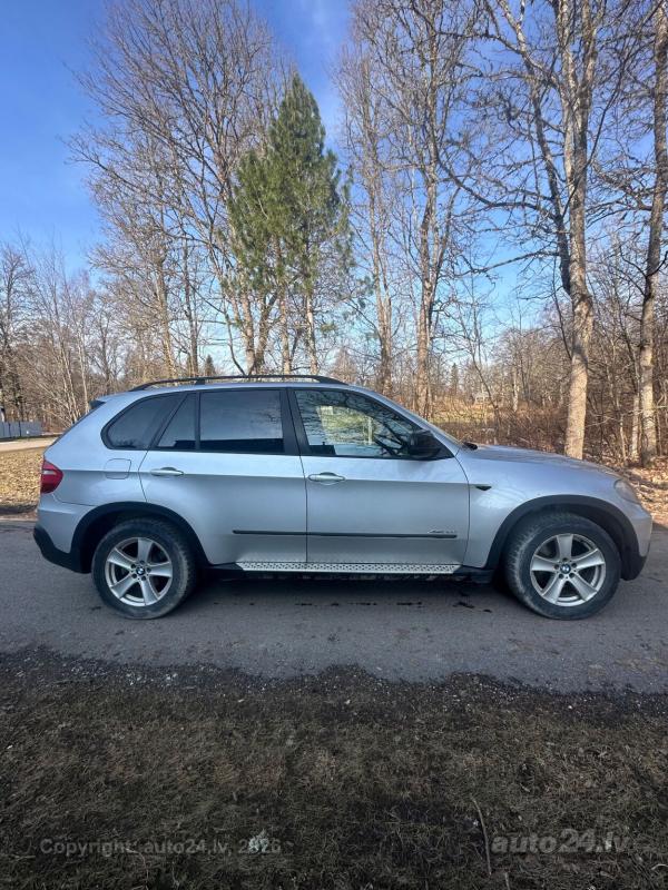 Grey BMW X5 2009 in Tallinn, with an engine capacity of 3.00 L and mileage of 345 thousand km for 7900 €, photo 2 on AUTOMOTO.COM.LV