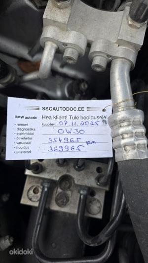 Pelēks BMW X5 2010 Kunda, ar dzinēja tilpumu 4.00 L un nobraukumu 356 tūkst. km par 21000 €, foto 29 vietnē AUTOMOTO.COM.LV