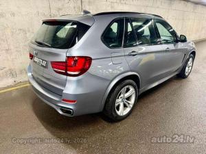 Grey BMW X5 2013 in Tallinn, with an engine capacity of 3.00 L and mileage of 178 thousand km for 19995 €, photo 4 on AUTOMOTO.COM.LV
