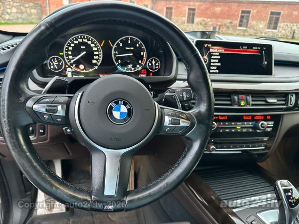 Grey BMW X5 2014 in Tartu, with an engine capacity of 3.00 L and mileage of 260 thousand km for 19900 €, photo 10 on AUTOMOTO.COM.LV