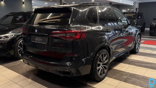 Black BMW X5 M 2021 in Marupe, with an engine capacity of 3.00 L and mileage of 154 thousand km for 43990 €, photo 3 on AUTOMOTO.COM.LV