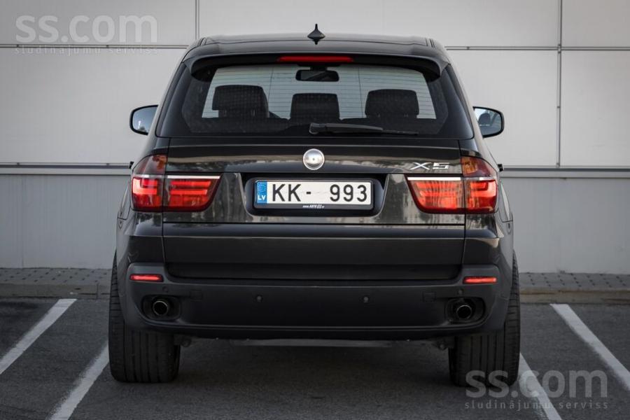 Orange BMW X5 2007 in Riga, with an engine capacity of 3.00 L and mileage of 258 thousand km for 9552 €, photo 6 on AUTOMOTO.COM.LV