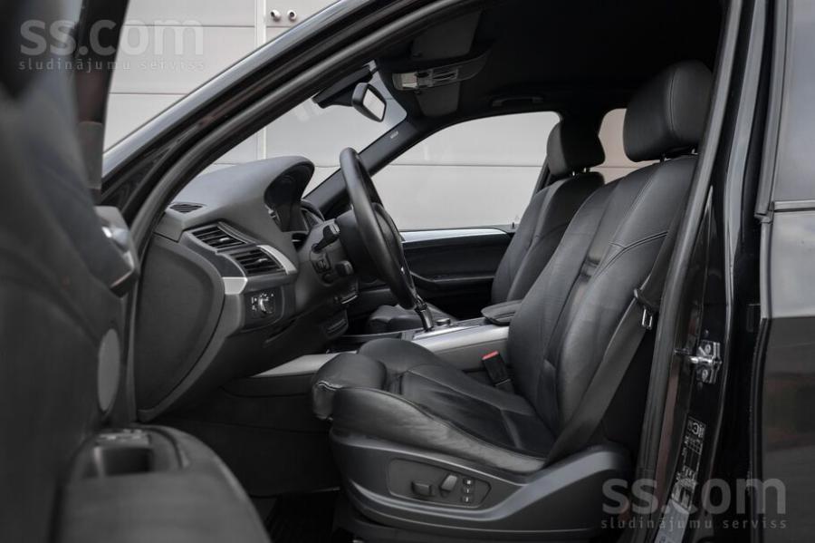 Orange BMW X5 2007 in Riga, with an engine capacity of 3.00 L and mileage of 258 thousand km for 9552 €, photo 9 on AUTOMOTO.COM.LV