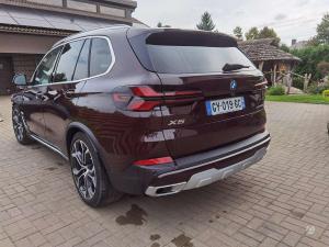 Sarkans BMW X5 2024 Kauņa, ar dzinēja tilpumu 3.00 L un nobraukumu 25 tūkst. km par 38500 €, foto 3 vietnē AUTOMOTO.COM.LV