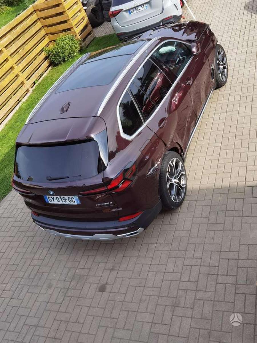 Sarkans BMW X5 2024 Kauņa, ar dzinēja tilpumu 3.00 L un nobraukumu 25 tūkst. km par 38500 €, foto 6 vietnē AUTOMOTO.COM.LV