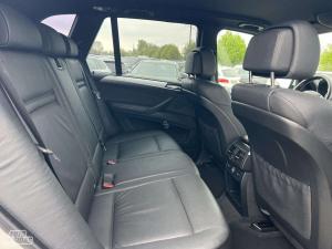 White BMW X5 2009 in Marijampole, with an engine capacity of 3.00 L and mileage of 265 thousand km for 11450 €, photo 26 on AUTOMOTO.COM.LV
