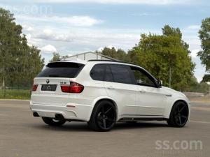 White BMW X5 2011 in Riga, with an engine capacity of 4.40 L and mileage of 0 thousand km for 19900 €, photo 7 on AUTOMOTO.COM.LV