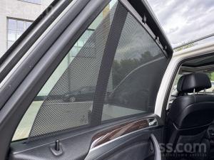 White BMW X5 2011 in Riga, with an engine capacity of 3.00 L and mileage of 297 thousand km for 10500 €, photo 14 on AUTOMOTO.COM.LV