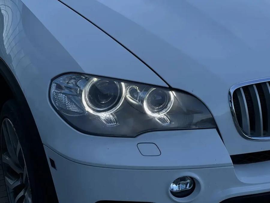 White BMW X5 2012 in Rezekne, with an engine capacity of 3.00 L and mileage of 210 thousand km for 15990 €, photo 12 on AUTOMOTO.COM.LV