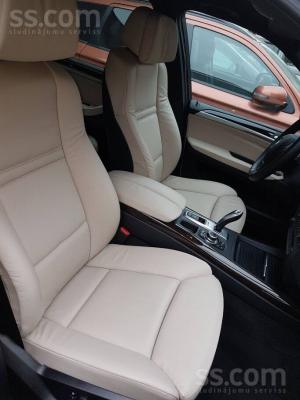 White BMW X5 2013 in Riga, with an engine capacity of 3.00 L and mileage of 125 thousand km for 19500 €, photo 5 on AUTOMOTO.COM.LV