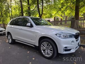 White BMW X5 2013 in Riga, with an engine capacity of 3.00 L and mileage of 0 thousand km for 18500 €, photo 4 on AUTOMOTO.COM.LV