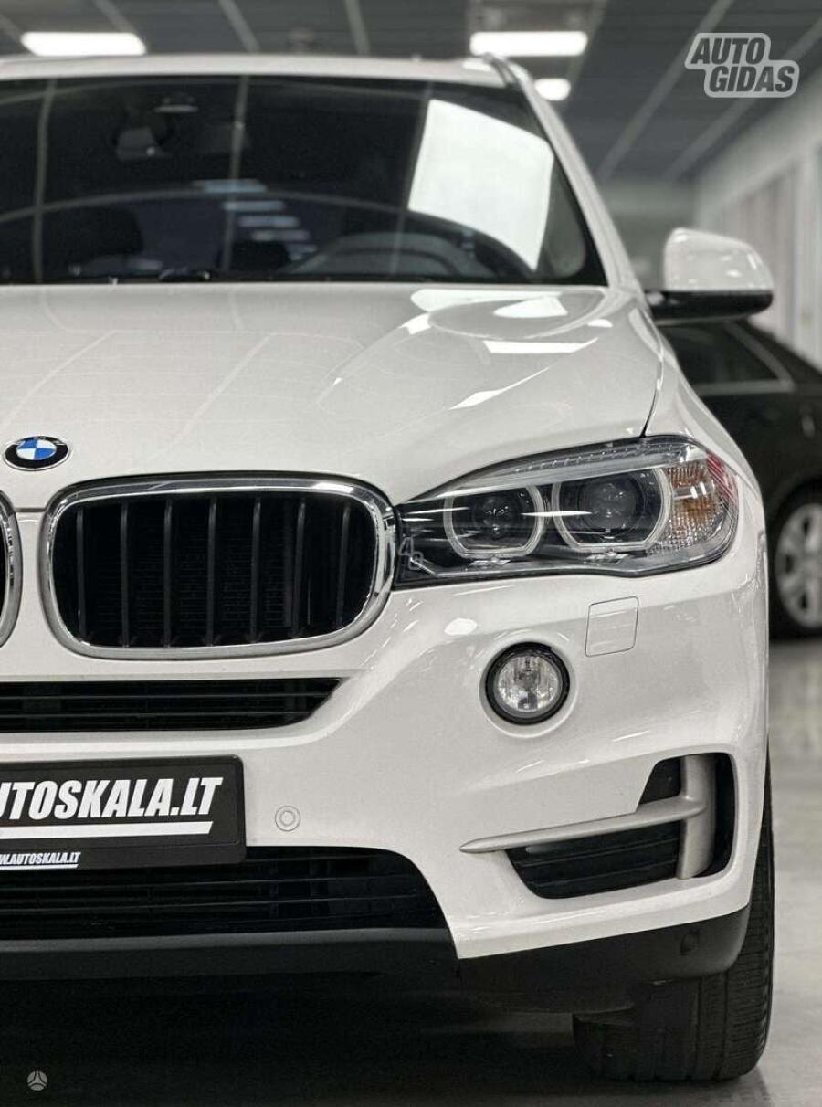 White BMW X5 2014 in Klaipeda, with an engine capacity of 2.00 L and mileage of 159 thousand km for 19750 €, photo 7 on AUTOMOTO.COM.LV
