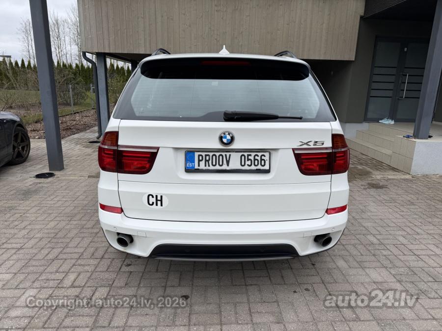 White BMW X5 2014 in Tartu, with an engine capacity of 3.00 L and mileage of 214 thousand km for 13999 €, photo 8 on AUTOMOTO.COM.LV